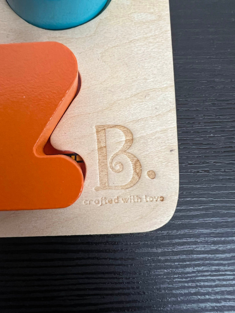 B. toys Wooden Alphabet Puzzle