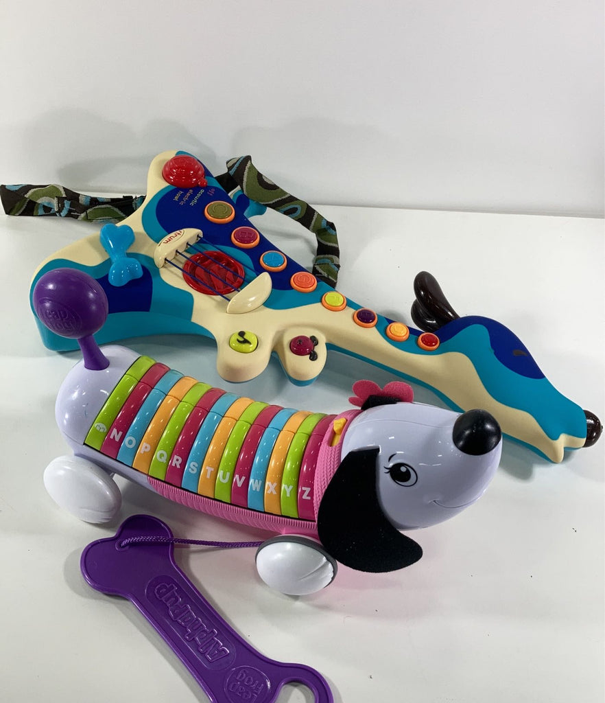B. toys B. Woofer Guitar And Alphapup