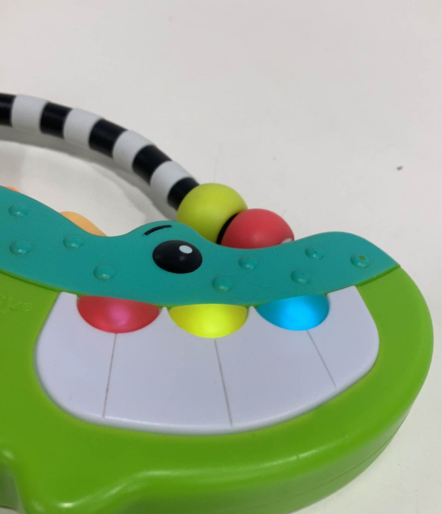 Sassy Rock-A-Dile Musical Toy