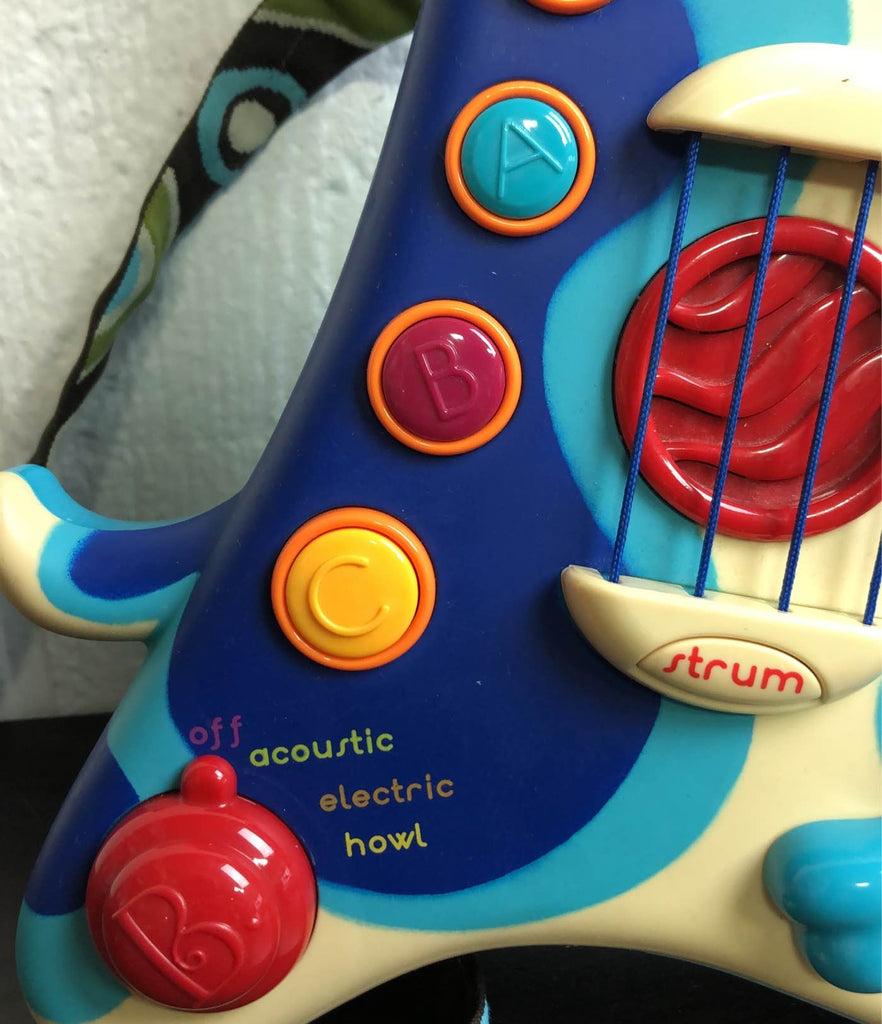 B. toys B. Woofer Guitar