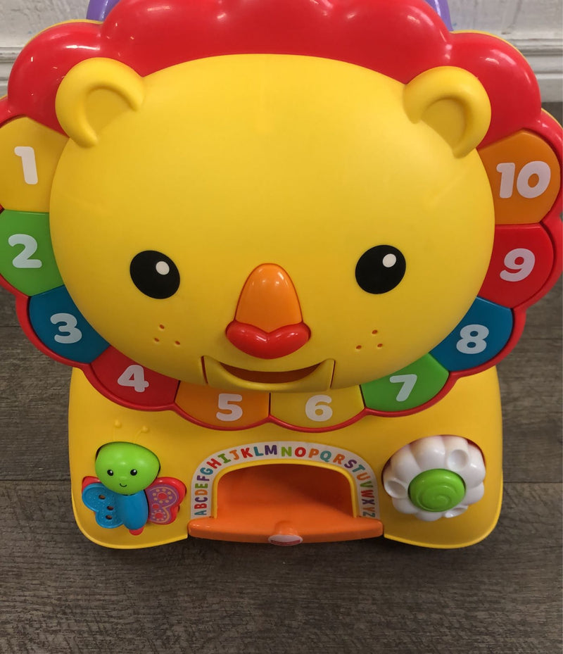Fisher Price 3-in-1 Sit, Stride, and Ride Lion Toy