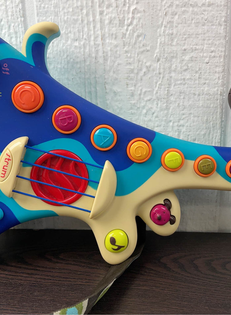 B. toys B. Woofer Guitar