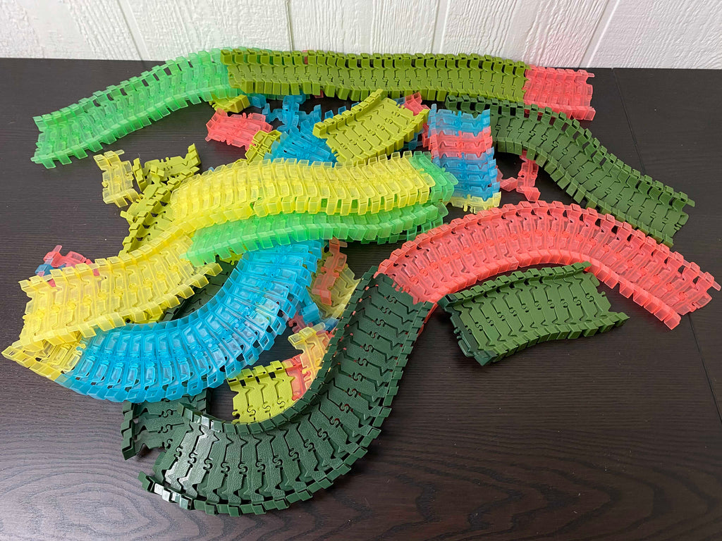 Flexible Track With Vehicles And Dinosaurs