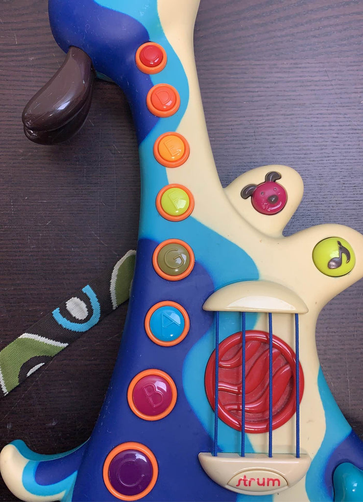 B. toys B. Woofer Guitar
