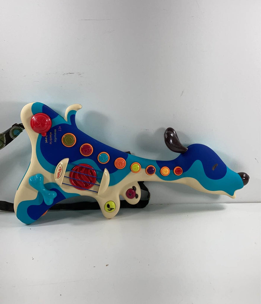 B. Toys B. Woofer Guitar