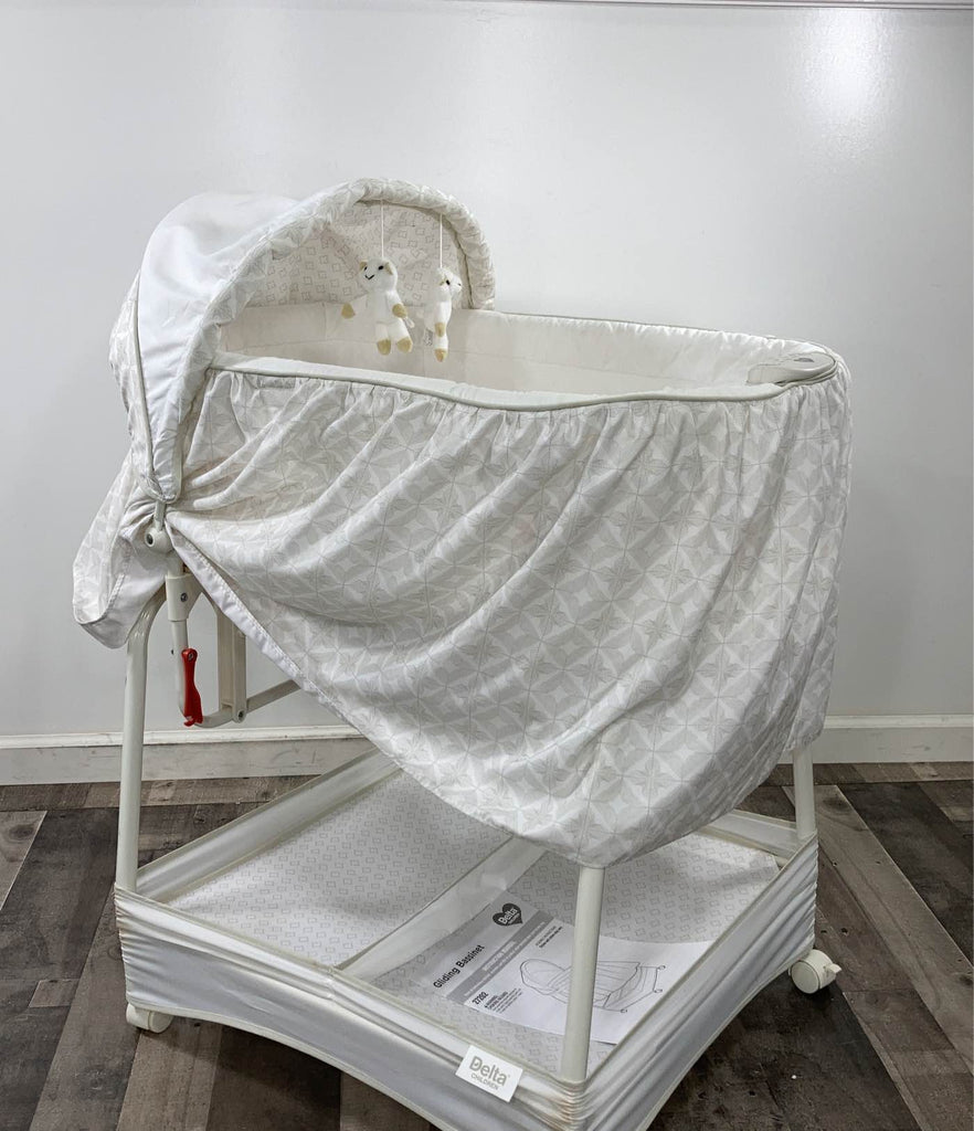 Delta Children Deluxe Gliding Bassinet